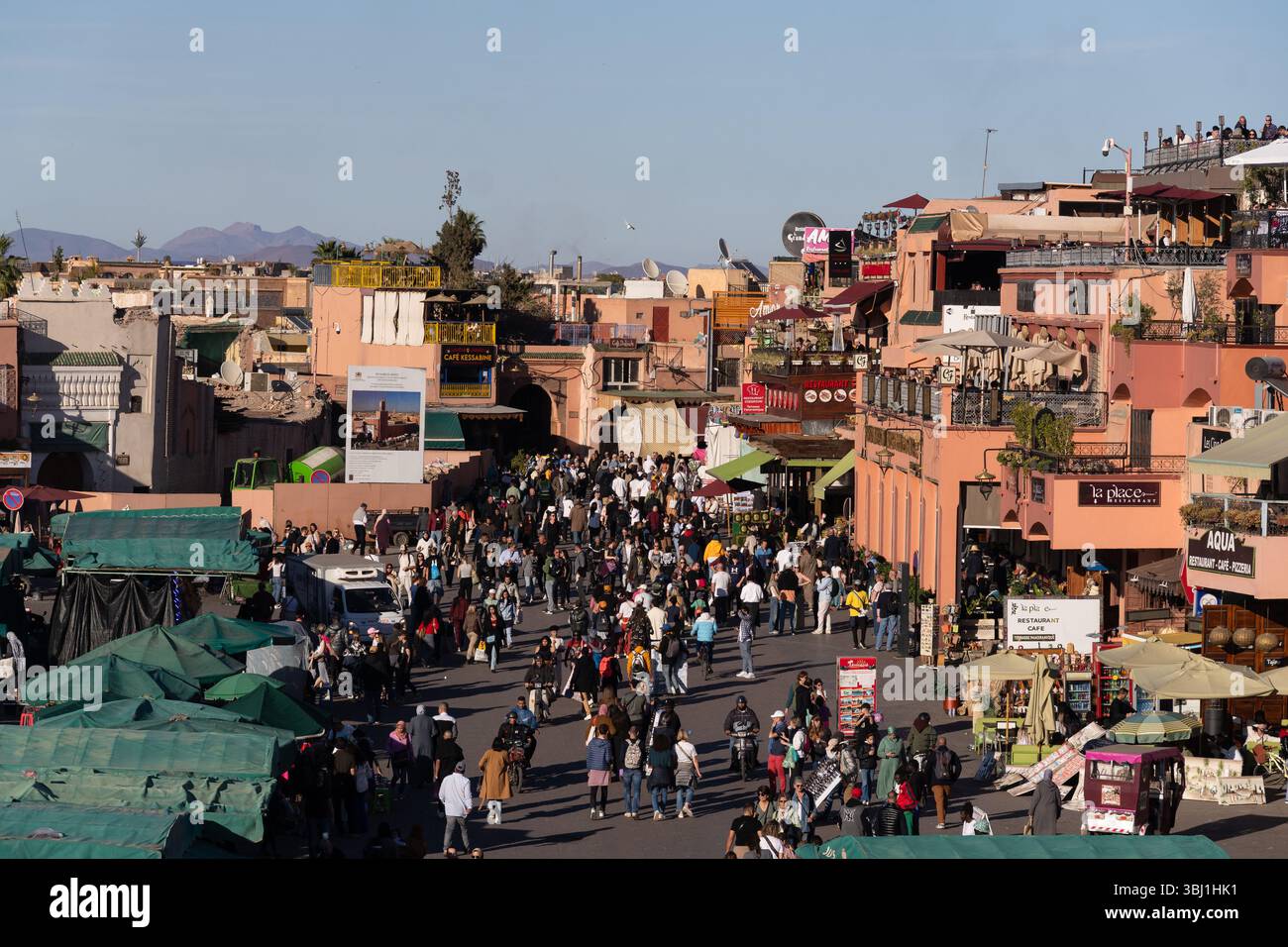 Marrakesh, Morocco - February 20 2025: Aerial view of people enjoy a ...