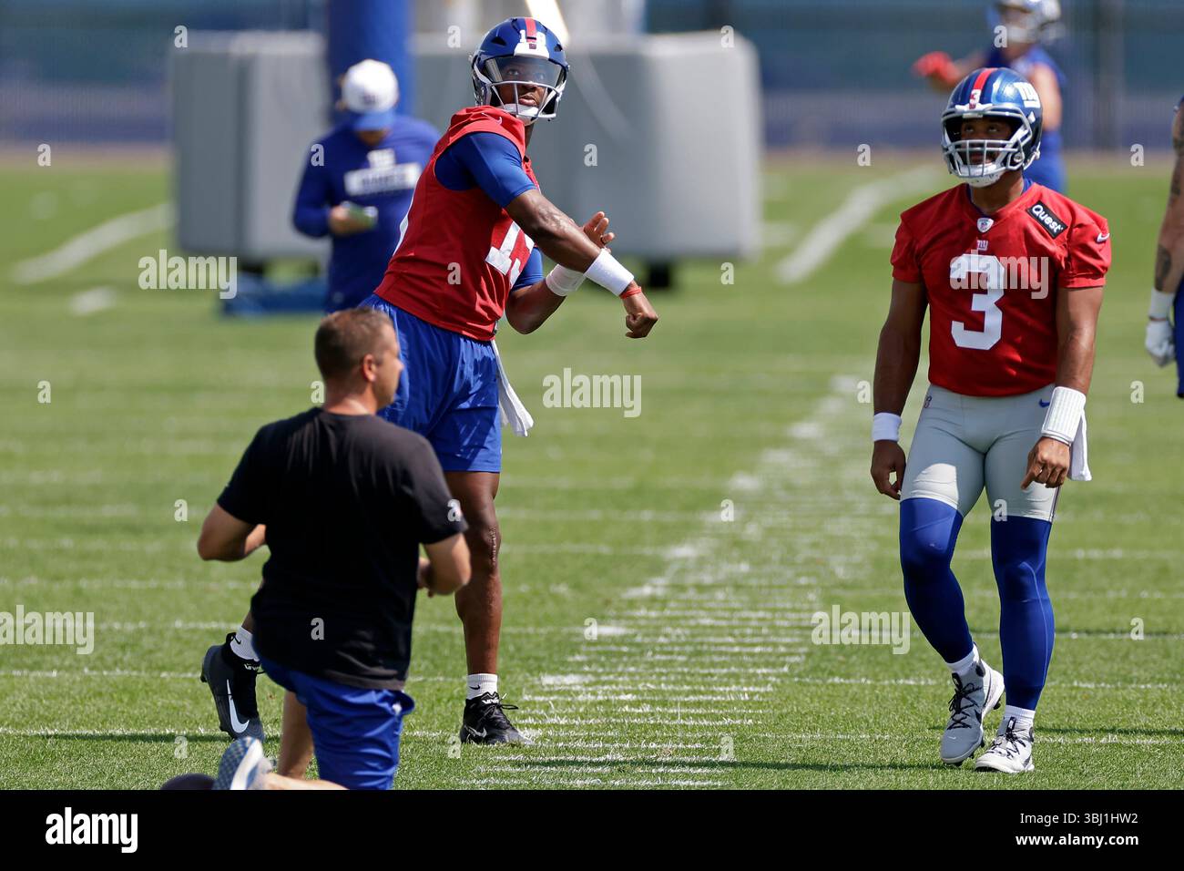 New York Giants quarterback Jameis Winston (19) throws in front of ...