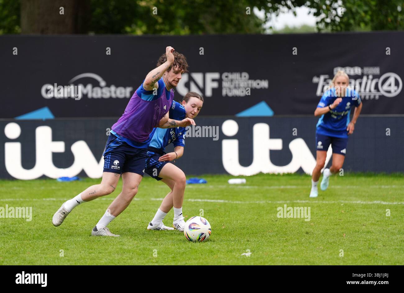 England's Tom Grennan and Bella Ramsey during a training session at ...