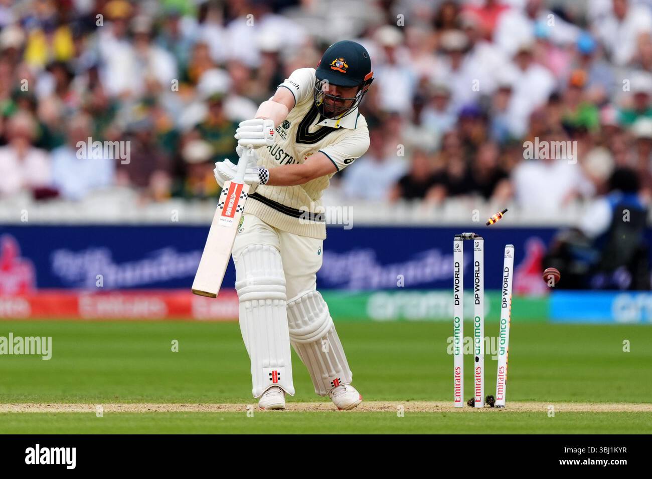 Australia's Travis Head is bowled by South Africa's Wiaan Mulder on day ...