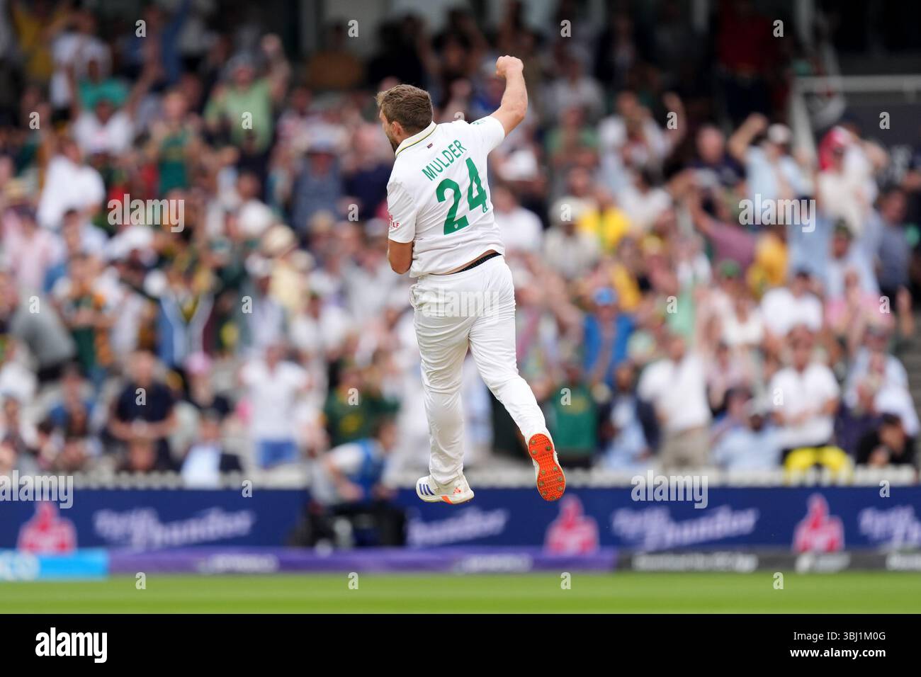South Africa's Wiaan Mulder celebrates the wicket of Australia's Travis ...