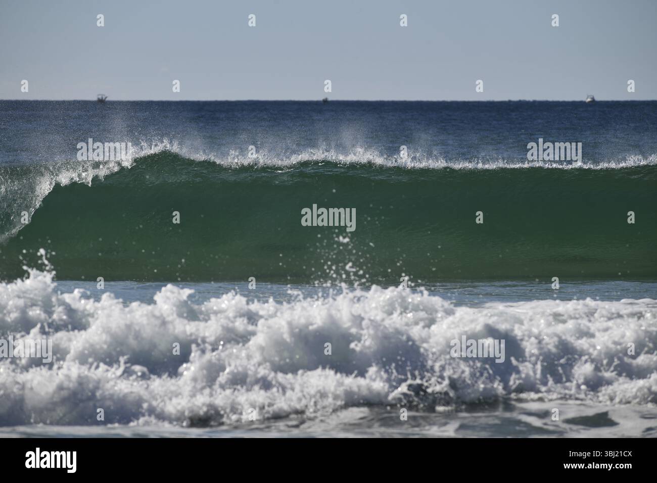 Waves breaking on a beach at the Sunshine Coast, Noosa, Queensland ...