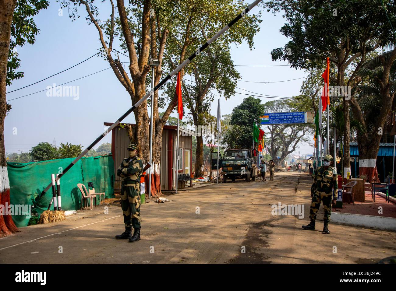 Members of the Border Security Force (BSF) stand guard at the Agartala ...
