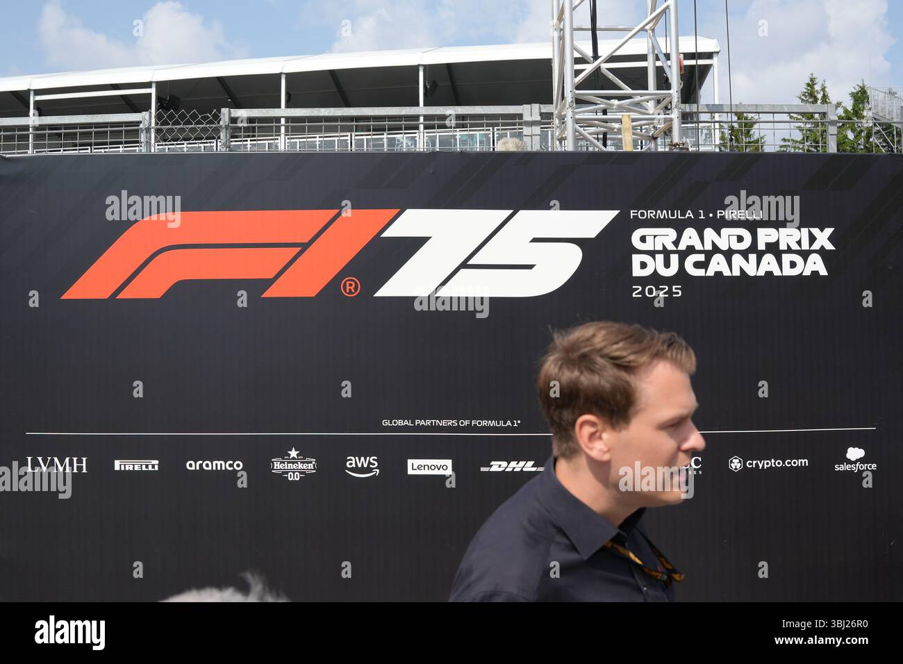 Montreal, Quebec, Canada – June 12, 2025: A man walks past the official ...
