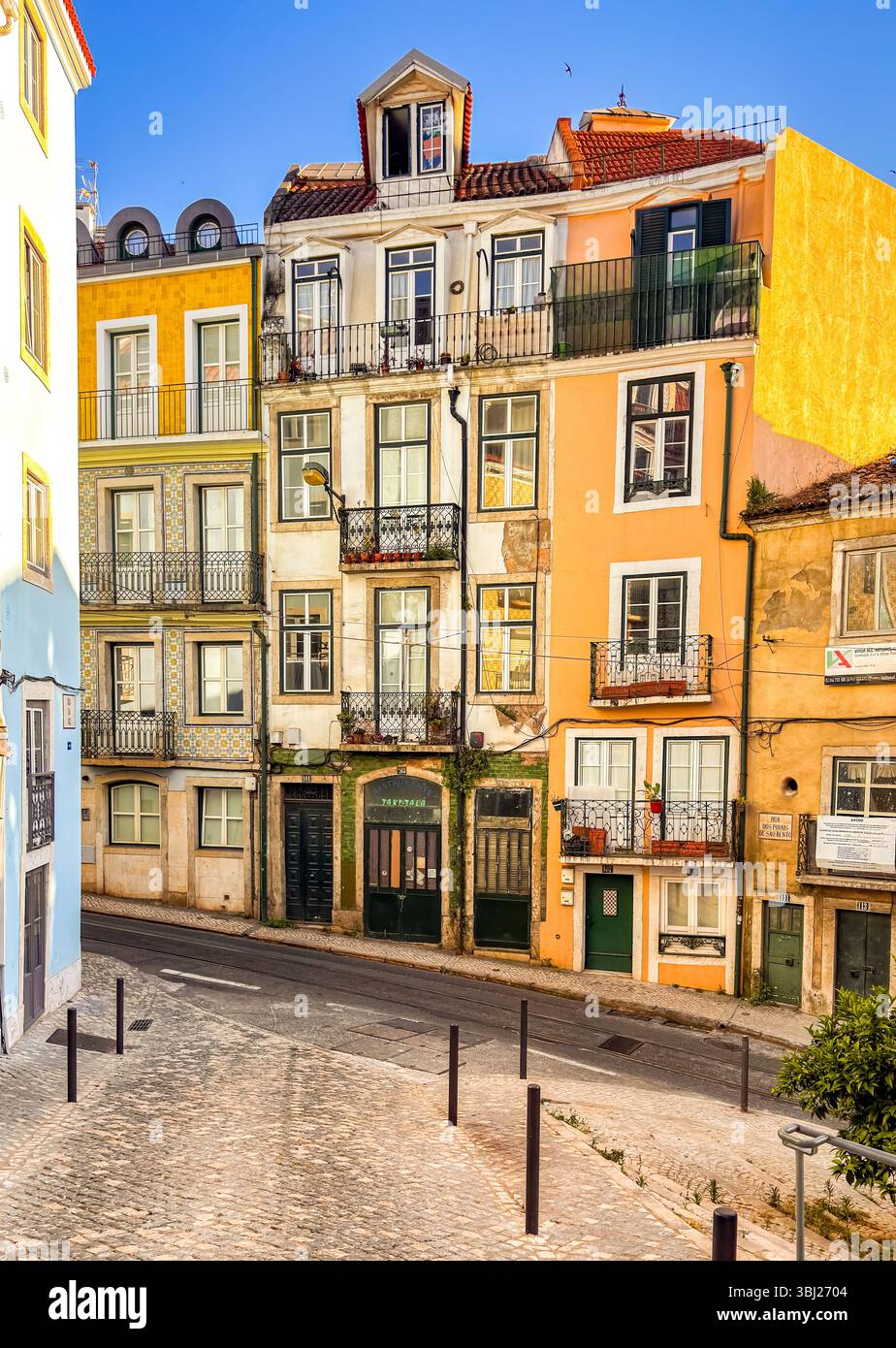 Colorful traditional Portuguese buildings with wrought iron balconies ...