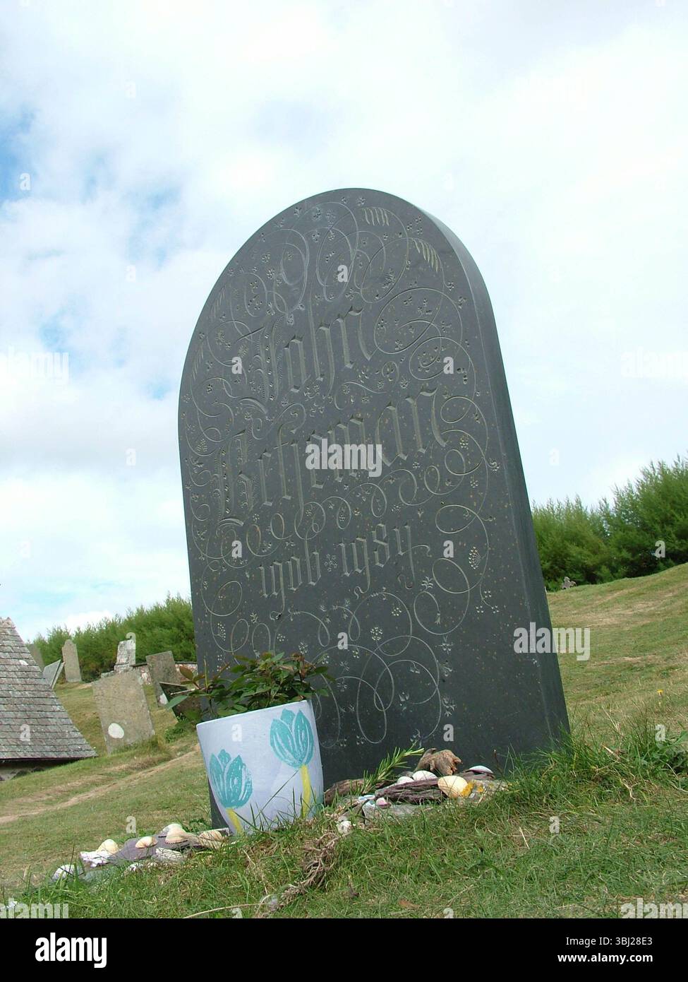 Poet Laureate Sir John Betjeman's grave and headstone in the graveyard ...
