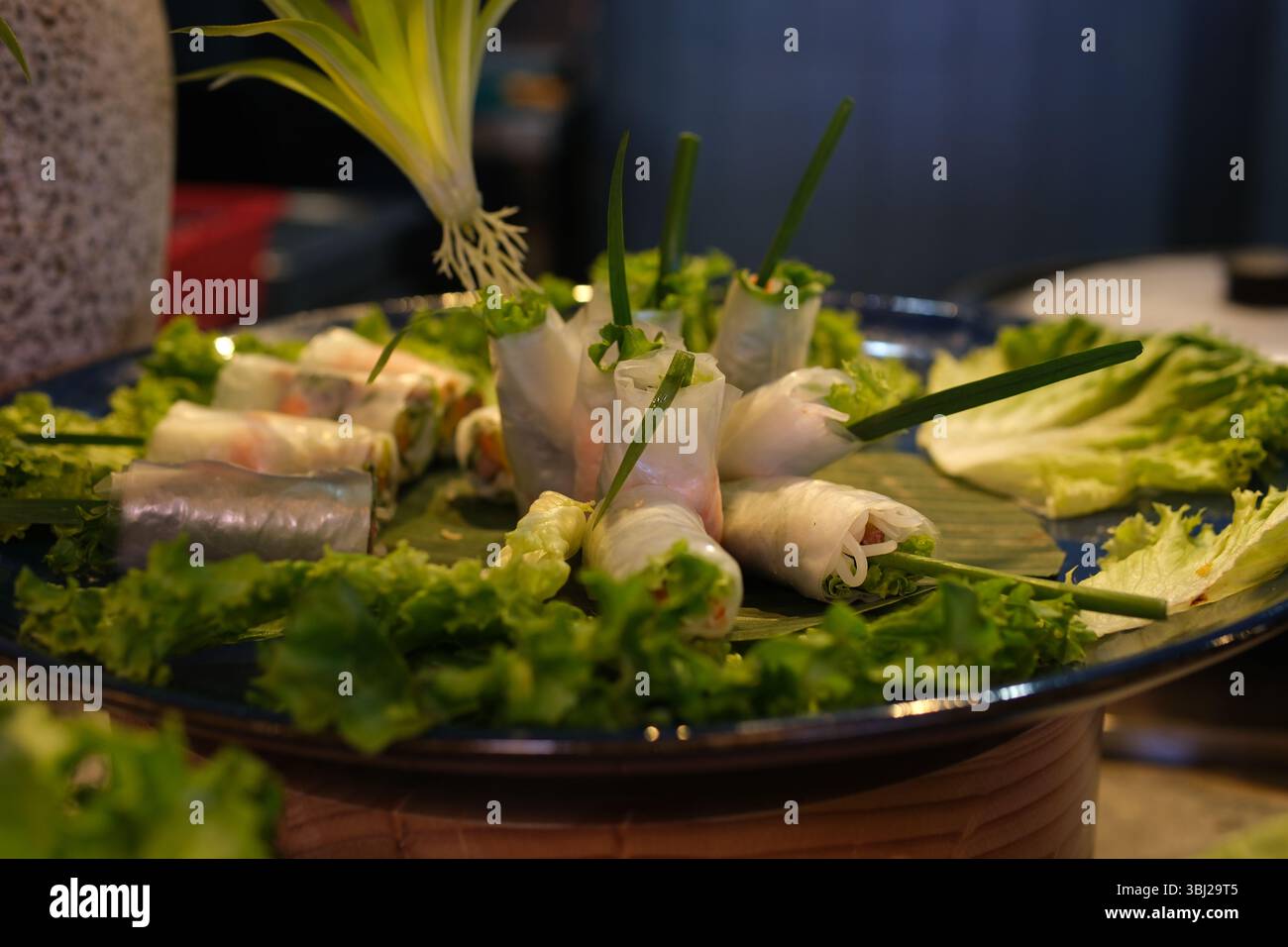 Tourists prepare eat spring roll hi-res stock photography and images ...