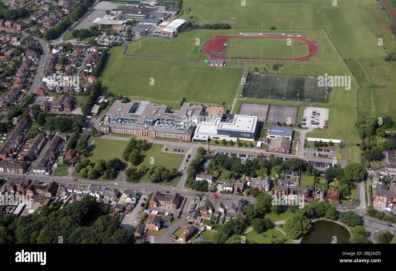 Aerial view of Wade Deacon High School, sports pitches & running track ...