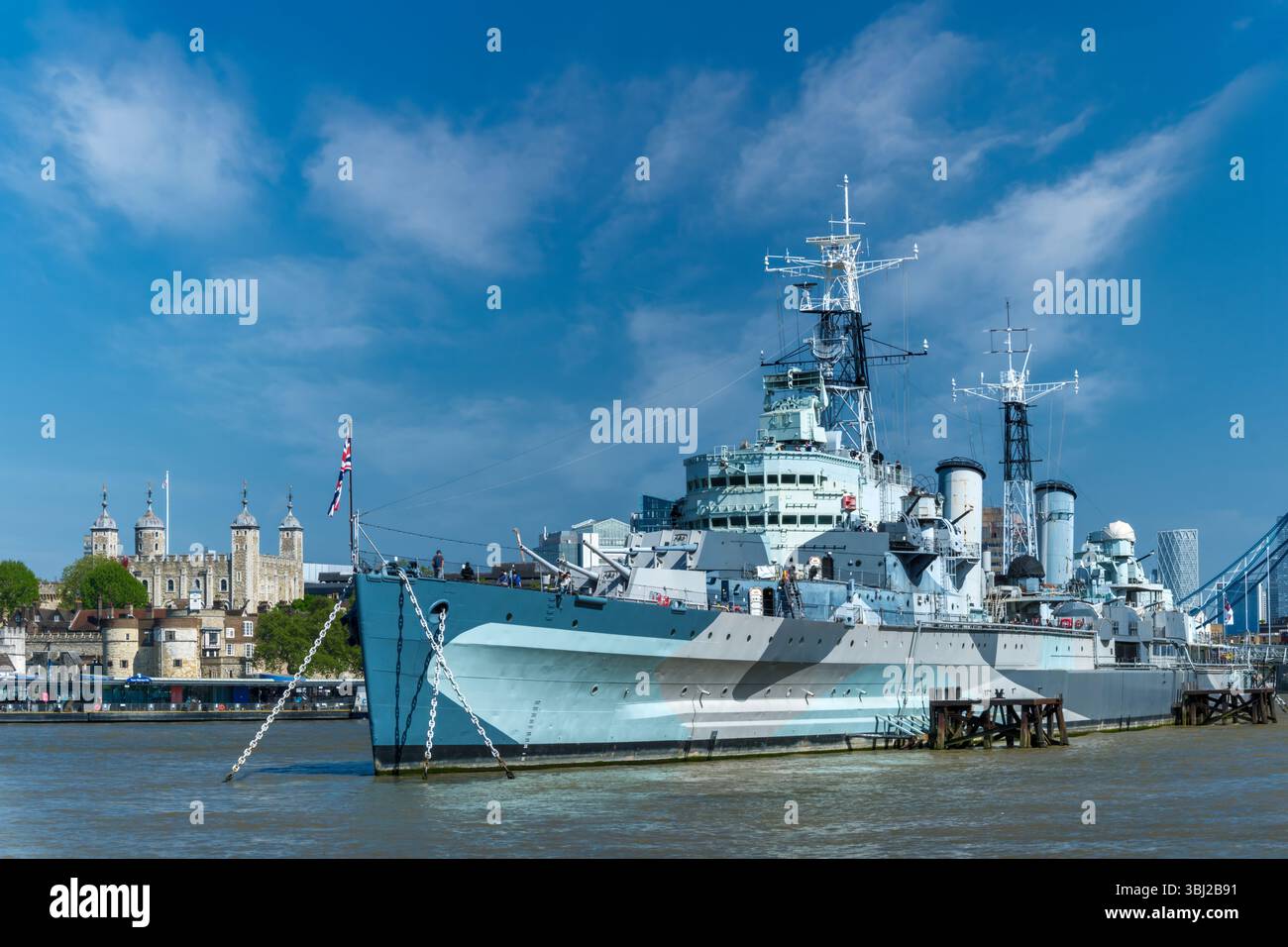 HMS Belfast moored on the River Thames alongside The Queens Walk in the ...