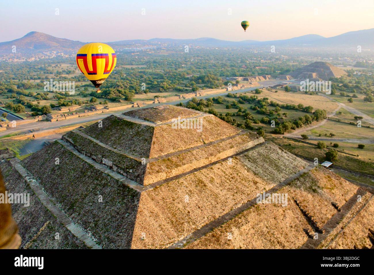 Hot Air Balloons Flying in the Sky at Sunrise Over the Teotihuacán ...