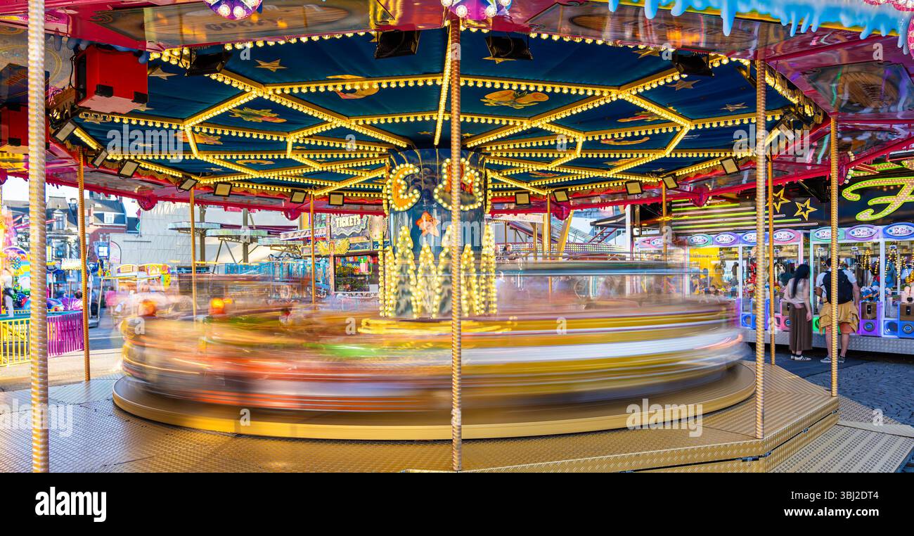 Maastricht, Netherlands - May 12, 2025: A vibrant carousel with ...
