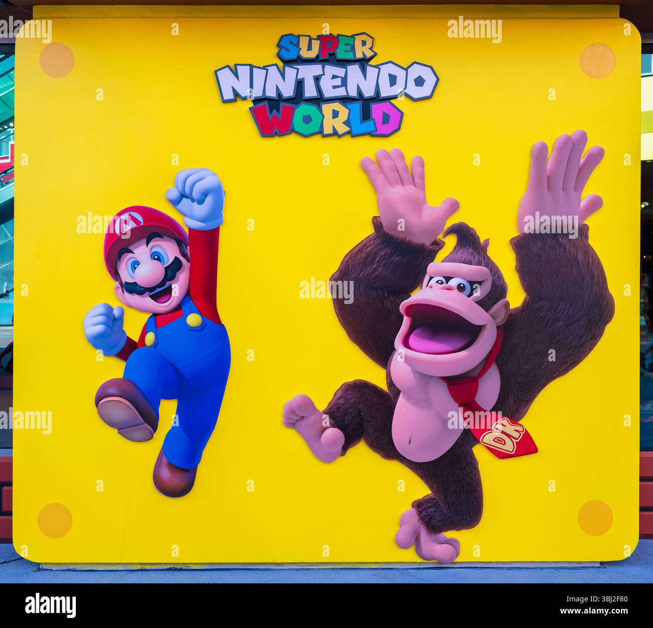 Billboard featuring Super Nintendo World bursts with color, showcasing ...
