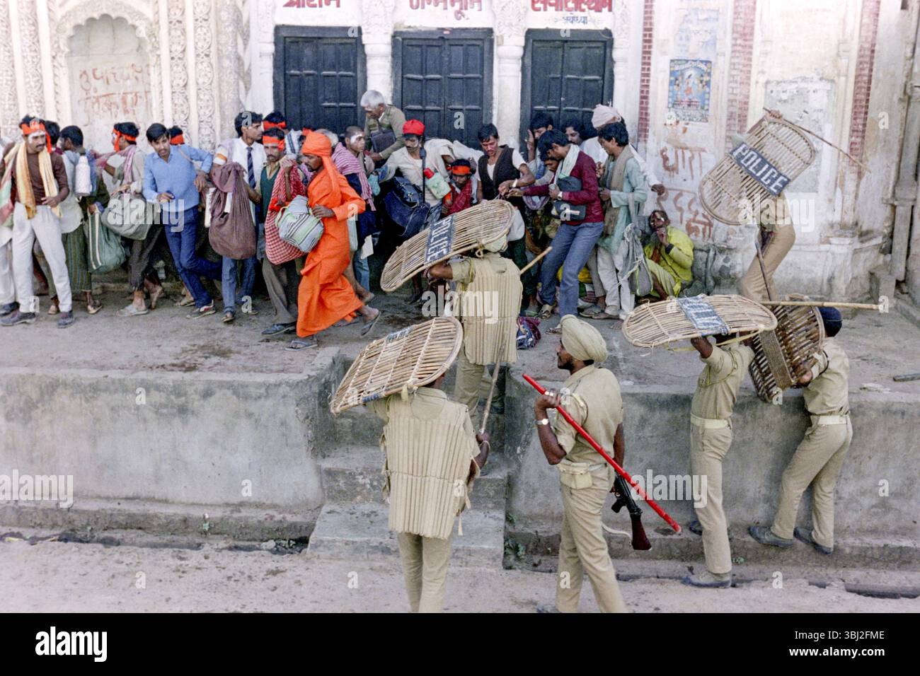 Indian riot police using bamboo staves to control violent protesters as ...