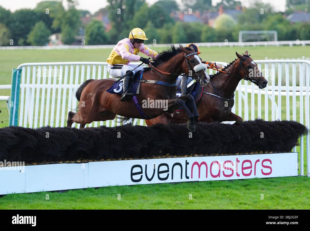 Prince Quattro and jockey Alex Chadwick (left) jumps the last on the ...