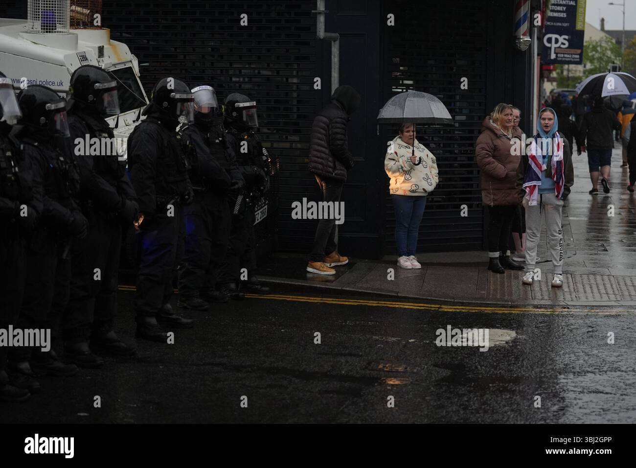 Armed police are present in Portadown in Co Armagh, following three ...