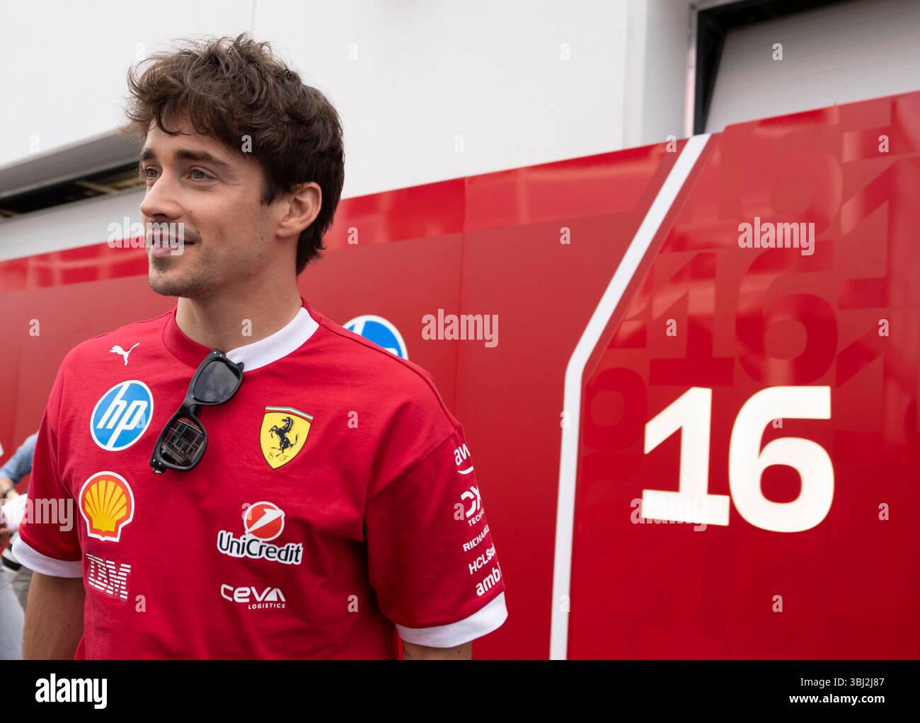 Ferrari driver Charles Leclerc, of Monaco, finishes an interview in the ...