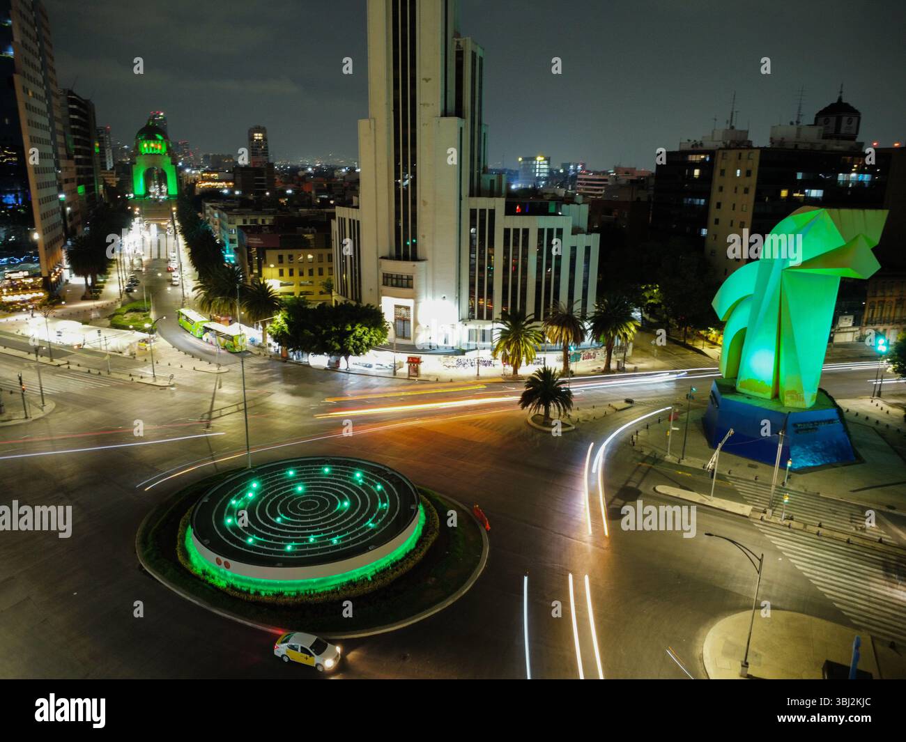 El Caballito monument is illuminated in green after the unveiling of ...