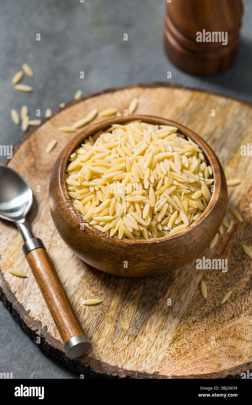 Organic Dried Orzo Pasta in a Bowl to Cook Stock Photo - Alamy