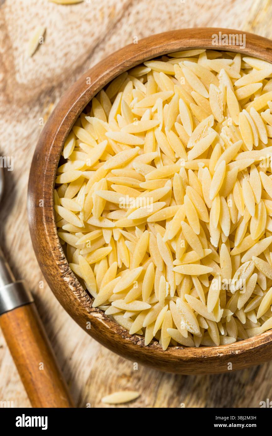 Organic Dried Orzo Pasta in a Bowl to Cook Stock Photo - Alamy