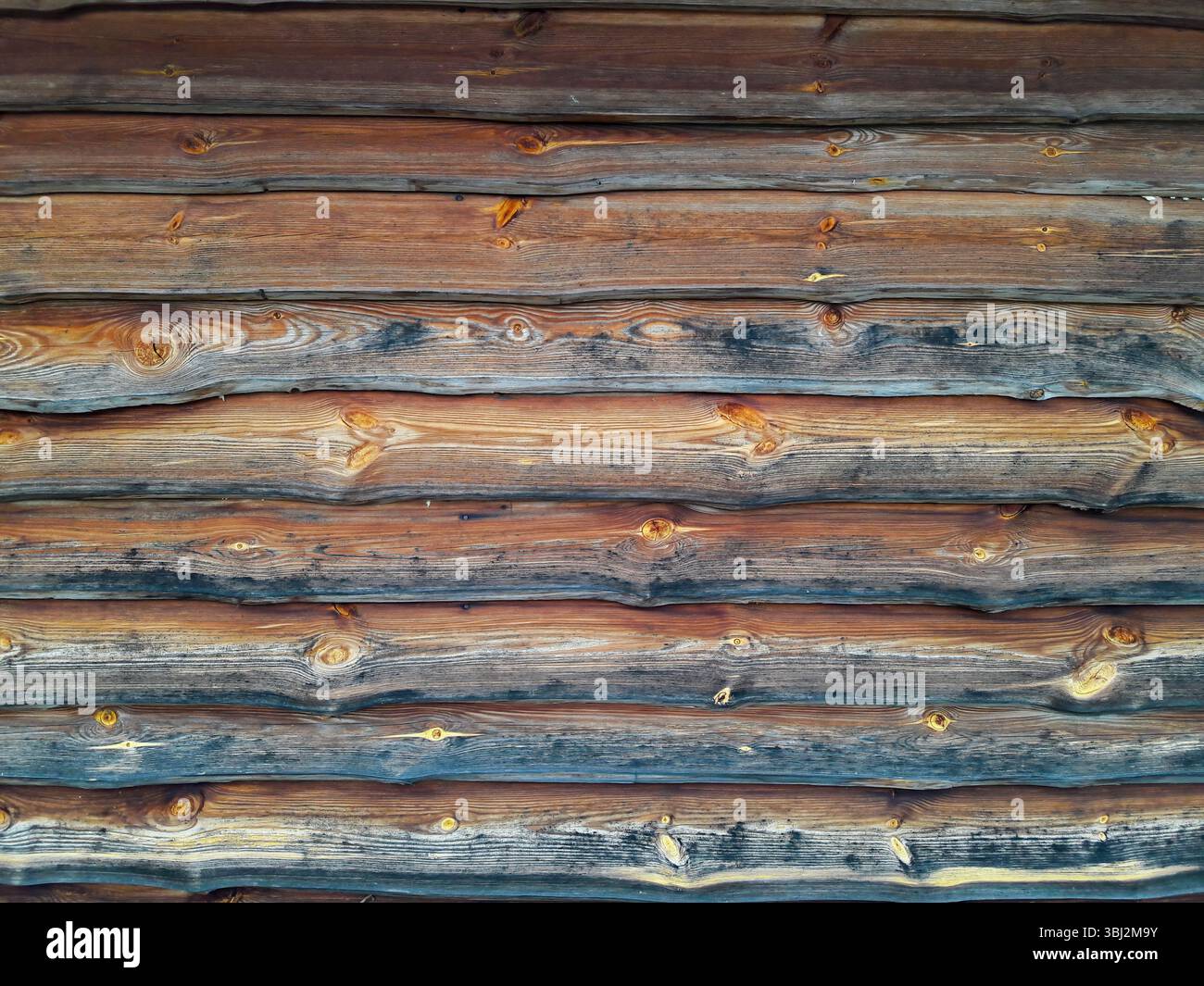 Textured Wooden Logs Featuring Natural Weathering Patterns That Enhance ...