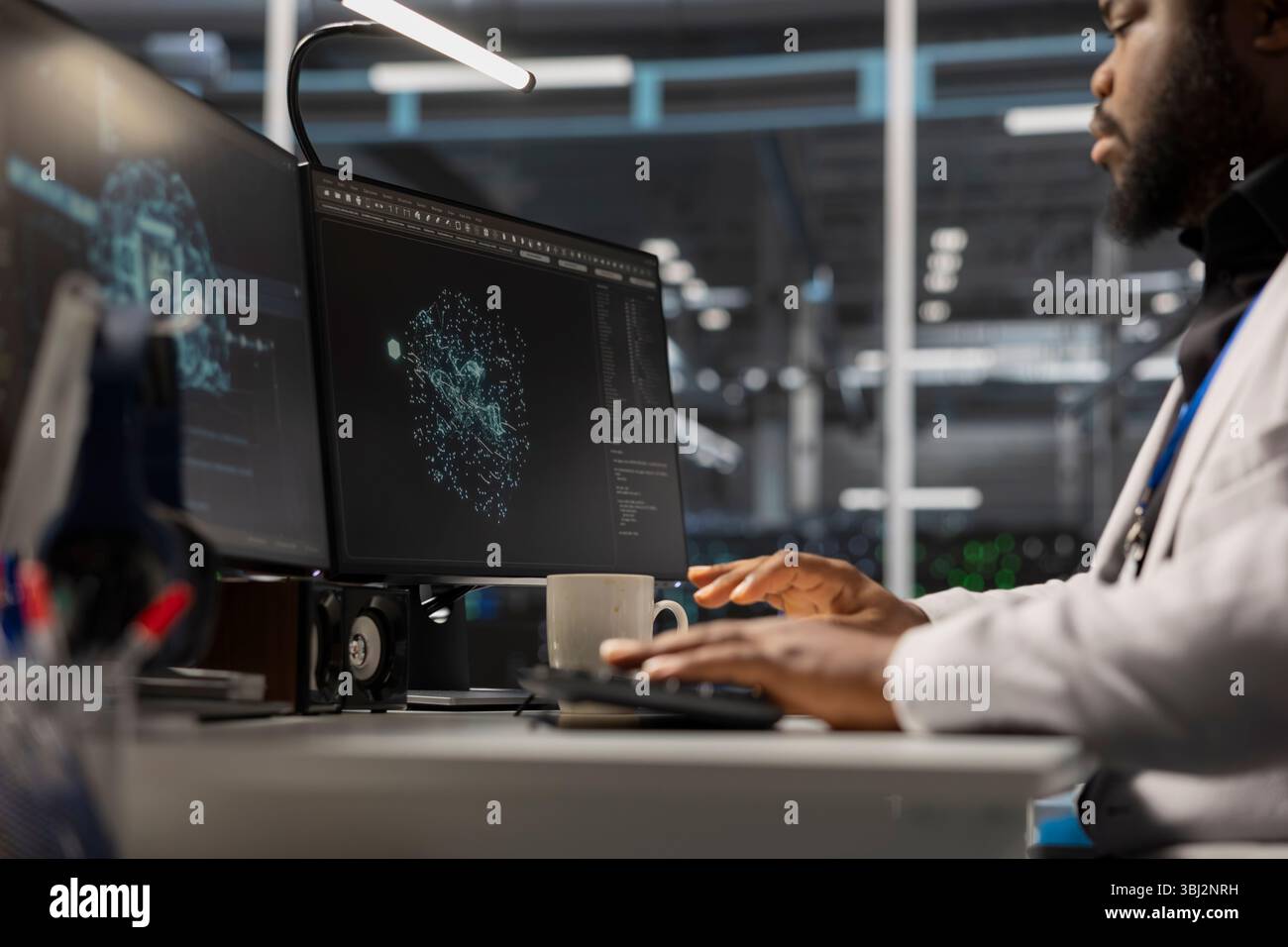 Engineer working on PC in data center housing artificial intelligence ...
