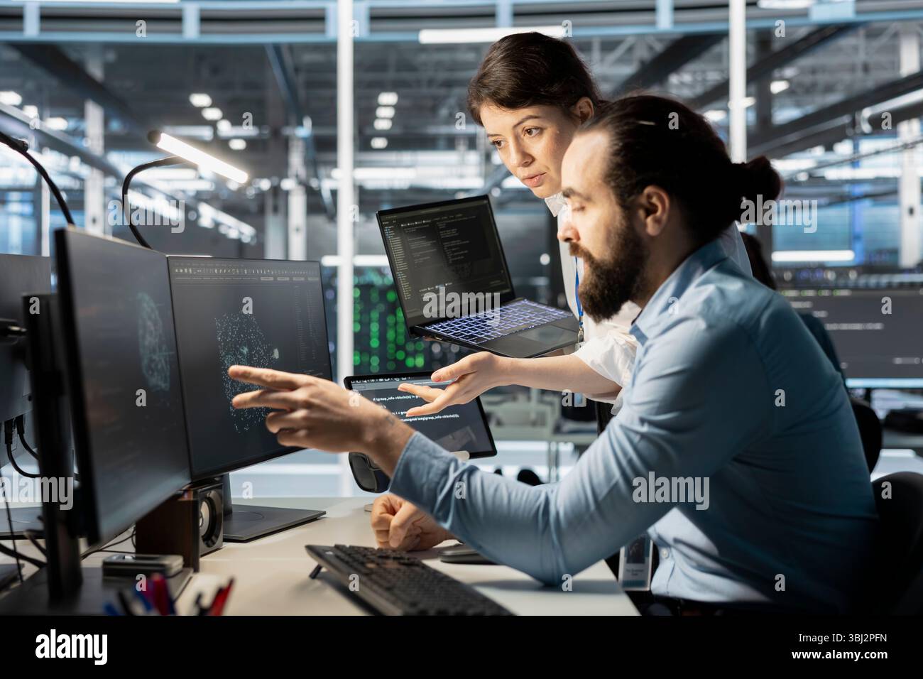 Data center manager supervising technician monitoring system ...