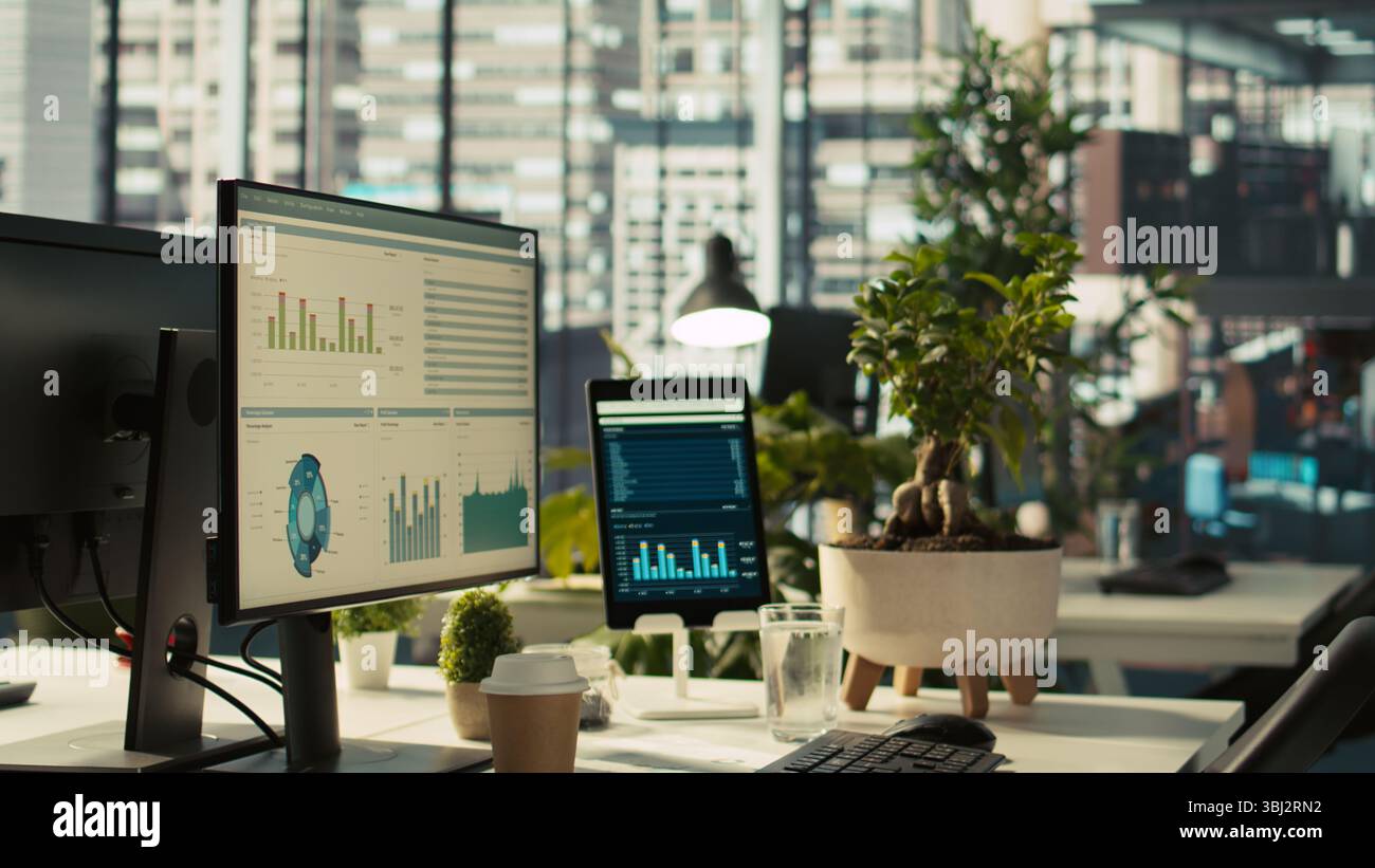 Modern workspace with analytical data dashboards displayed on devices ...