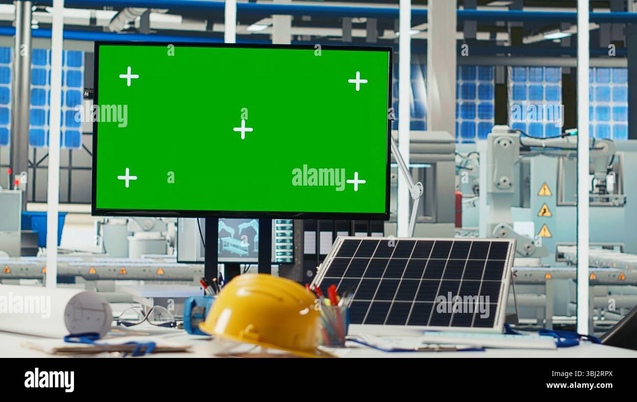 Isolated screen display in photovoltaics factory used to monitor performance of robot arms ...