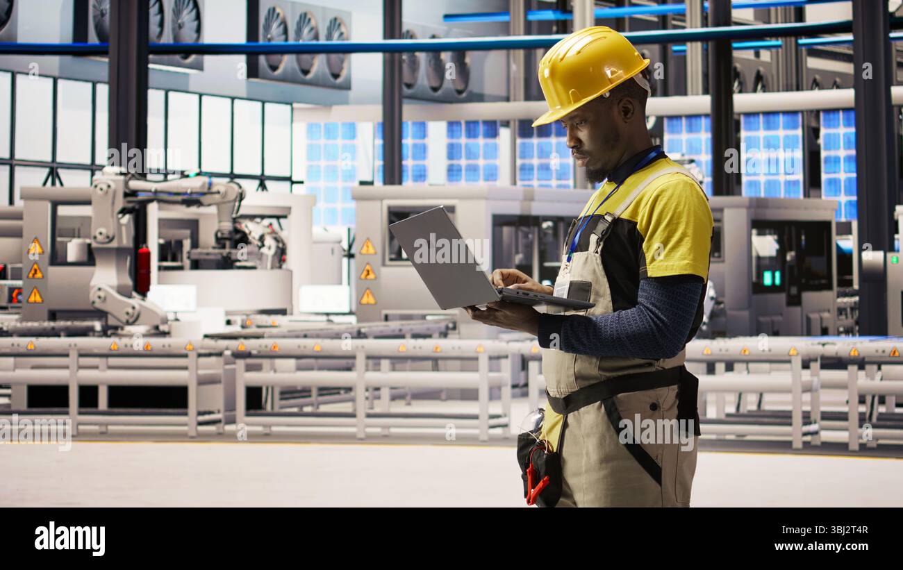 Smart factory specialist typing hi-res stock photography and images - Alamy