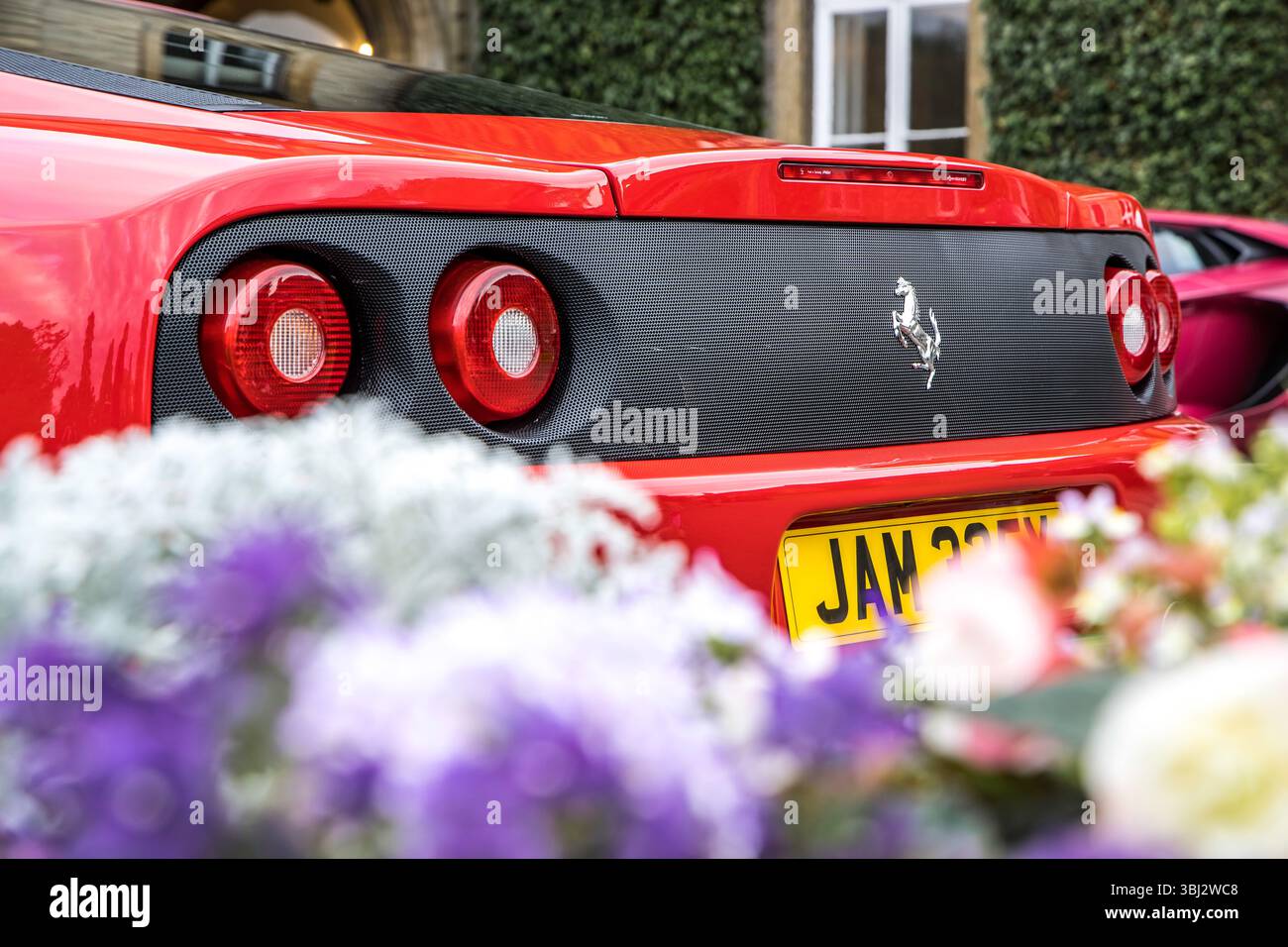 Bristol, UK- August 23, 2023: Rear view of the impressive red Italian ...
