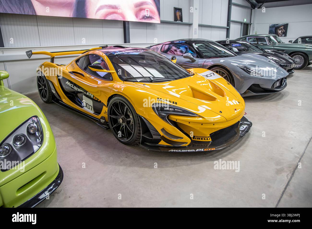 Bradford-on-Avon, UK- August 28, 2023: Yellow McLaren P1 2012, side ...
