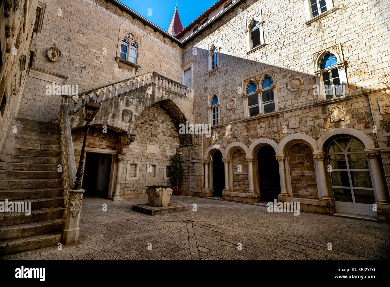 Roman-Gothic courtyard of St. Lawrence Cathedral in Trogir, Croatia and ...