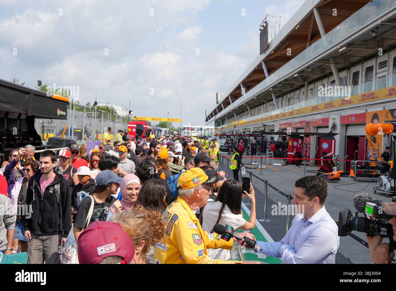 Montreal, Quebec, Canada – June 12, 2025: Fans gather in the pit lane at Circuit Gilles ...