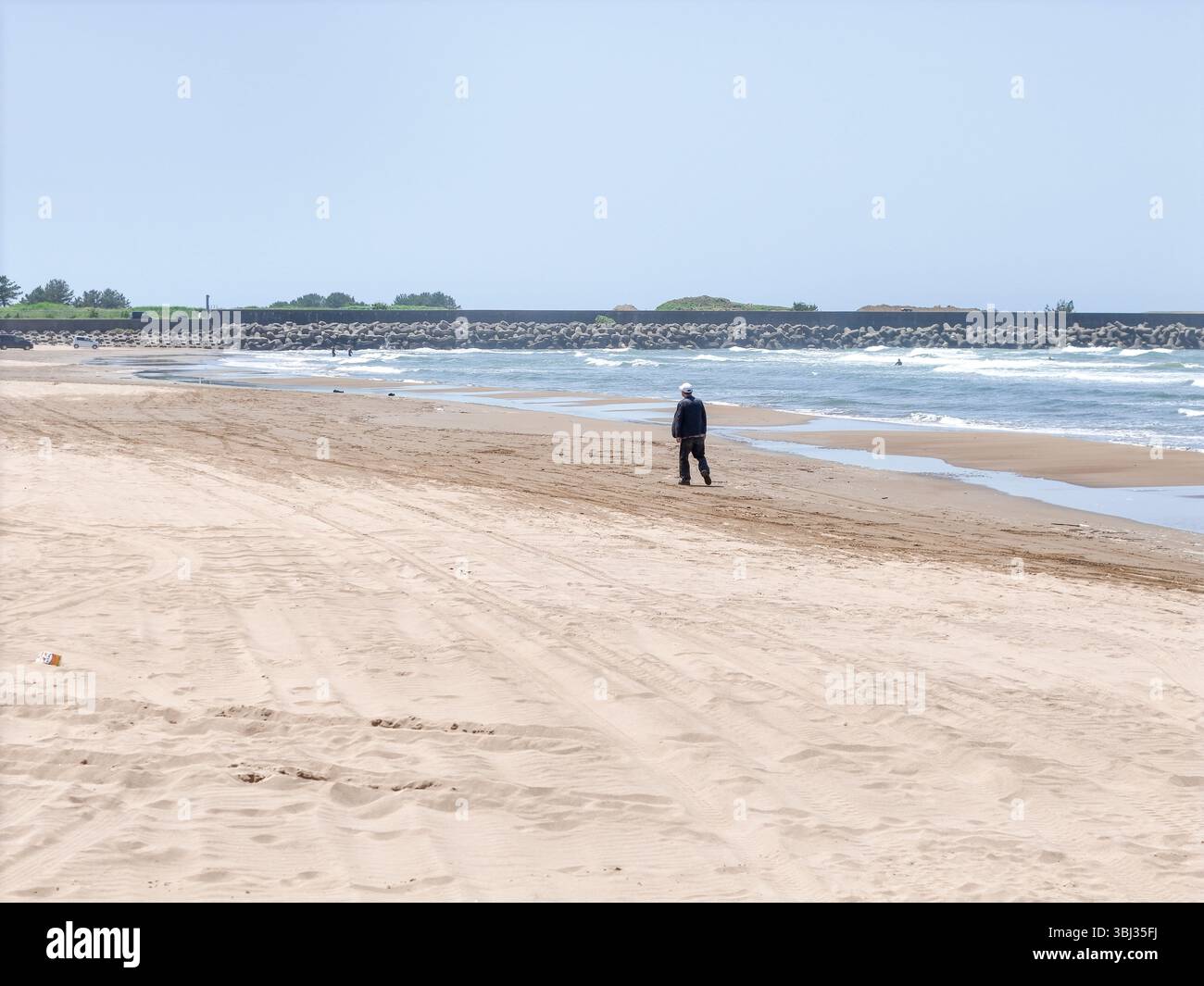 Man on beach captured hi-res stock photography and images - Alamy