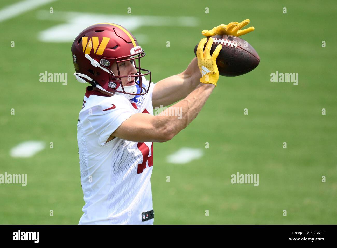 Washington Commanders wide receiver Luke McCaffrey (11) works out ...