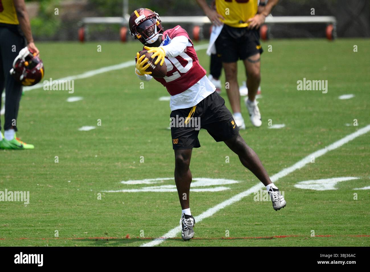 Washington Commanders safety Quan Martin (20) works out during NFL ...