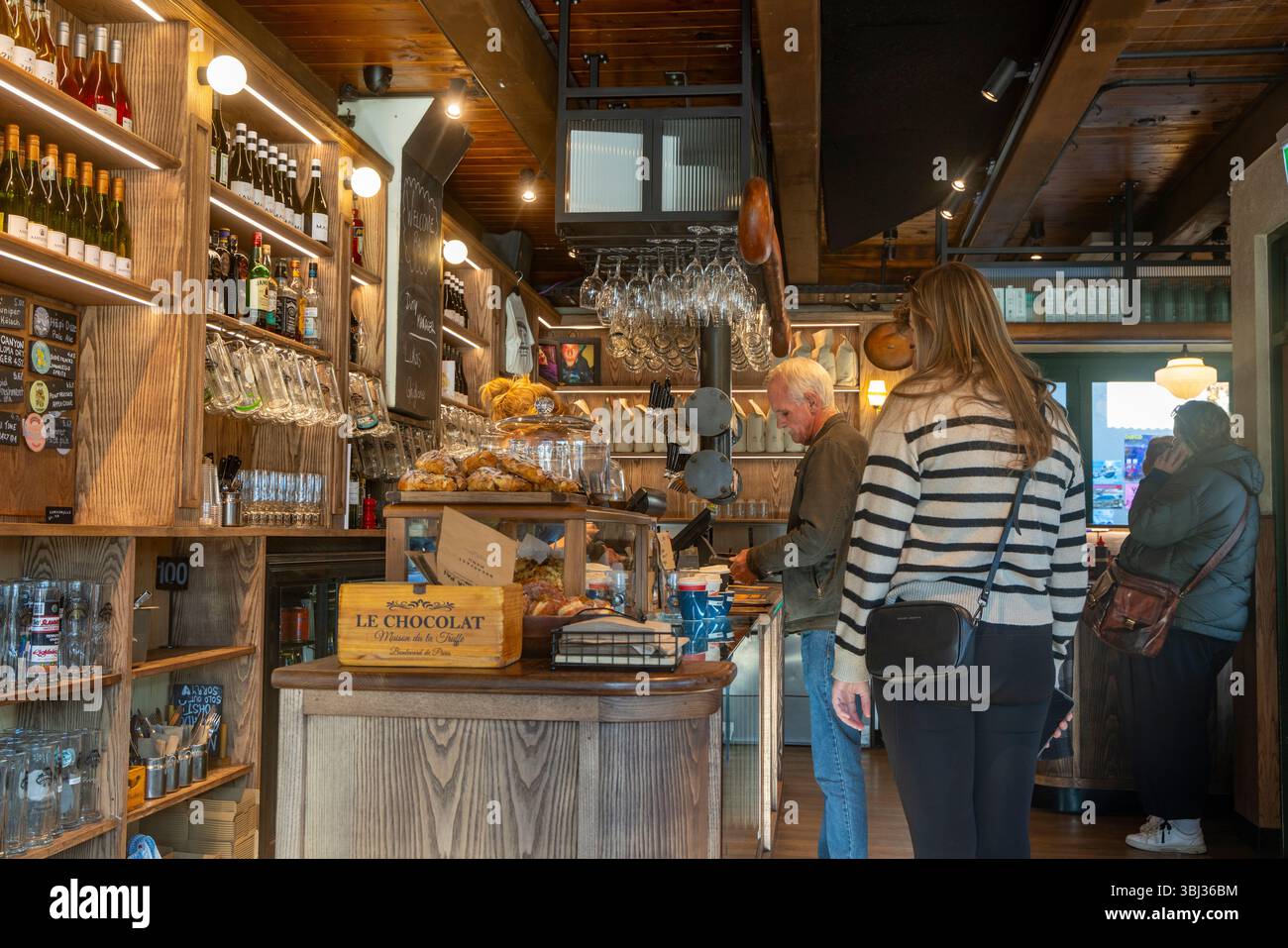 Wanaka town centre cafe, South Island,New Zealand, customer inside cafe ...