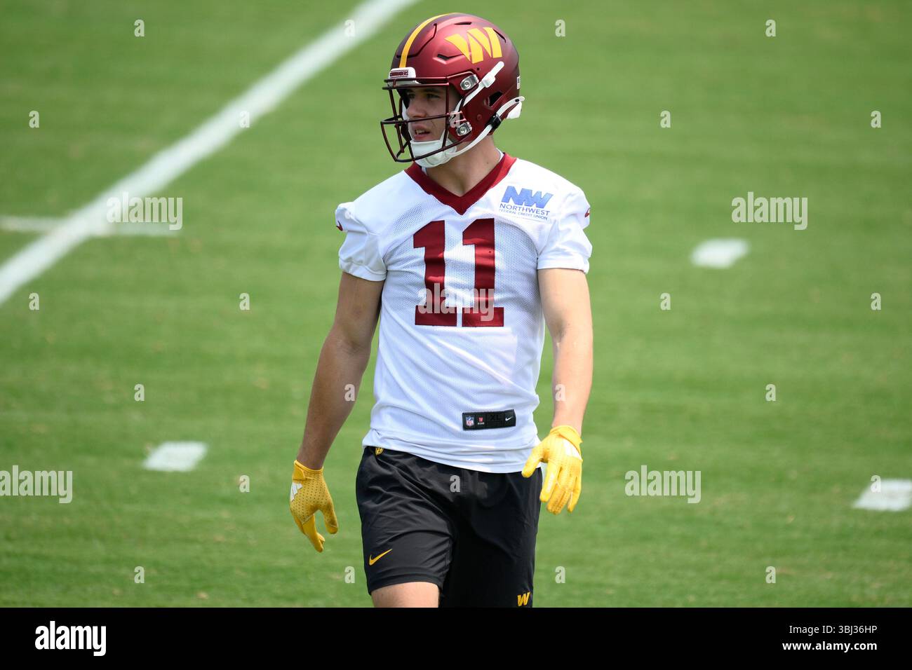 Washington Commanders wide receiver Luke McCaffrey (11) works out ...