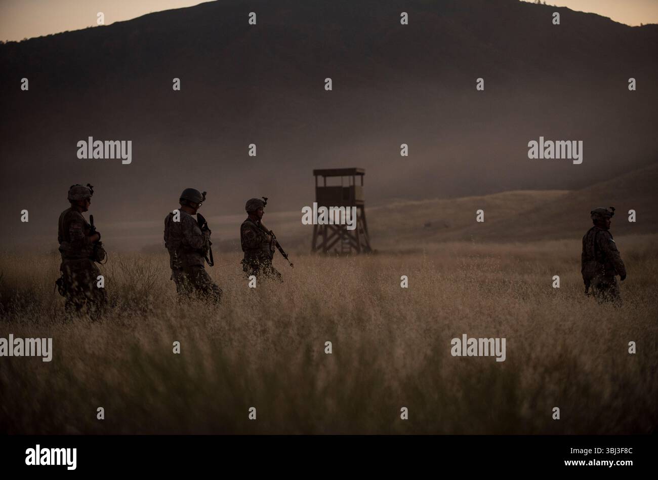Military patrol sunset soldiers walking hi-res stock photography and ...
