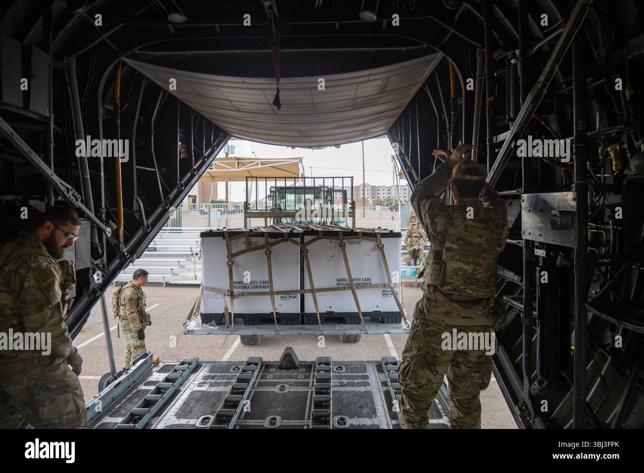 Airmen assigned to the 23d Combat Air Base Squadron demonstrate aircraft cargo loading and ...