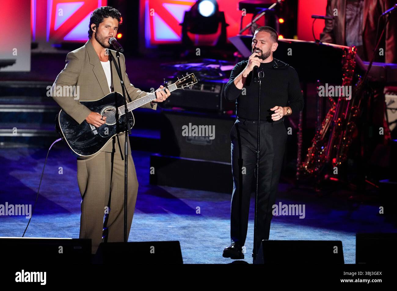 Dan Smyers, left, and Shay Mooney of Dan + Shay perform during the 54th ...