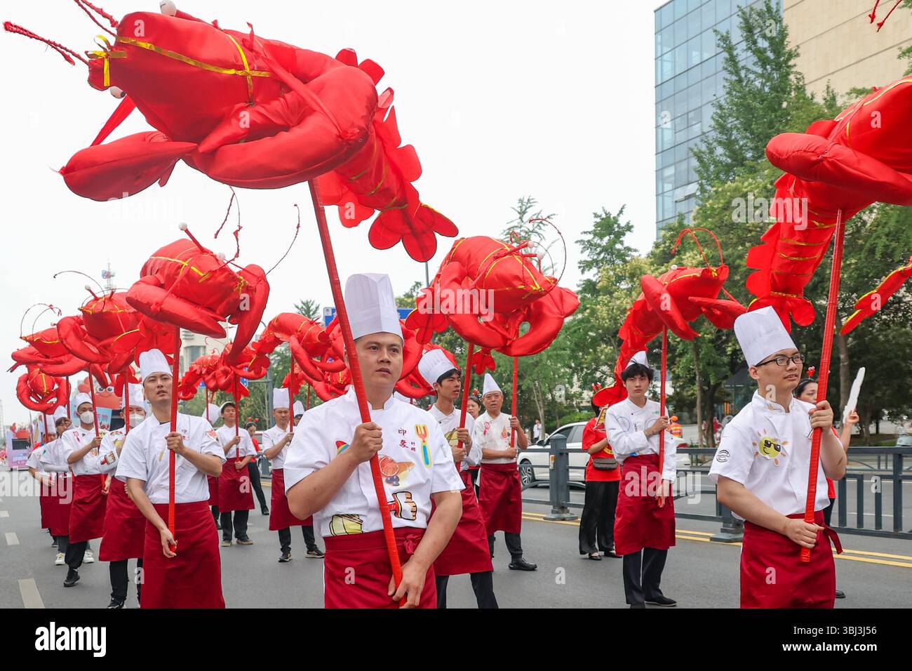 **CHINESE MAINLAND, HONG KONG, MACAU AND TAIWAN OUT** People parade at ...