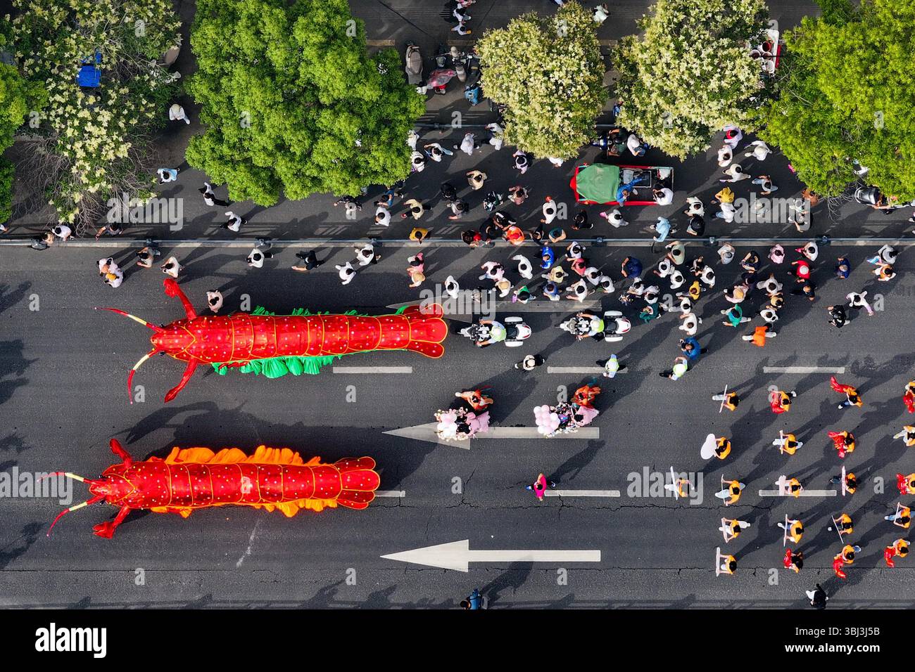**CHINESE MAINLAND, HONG KONG, MACAU AND TAIWAN OUT** People parade at ...