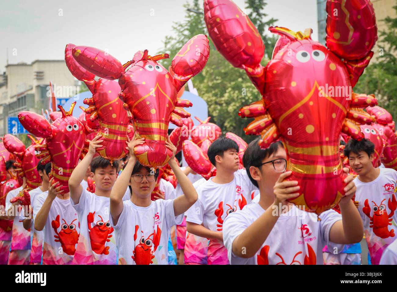 **CHINESE MAINLAND, HONG KONG, MACAU AND TAIWAN OUT** People parade at ...