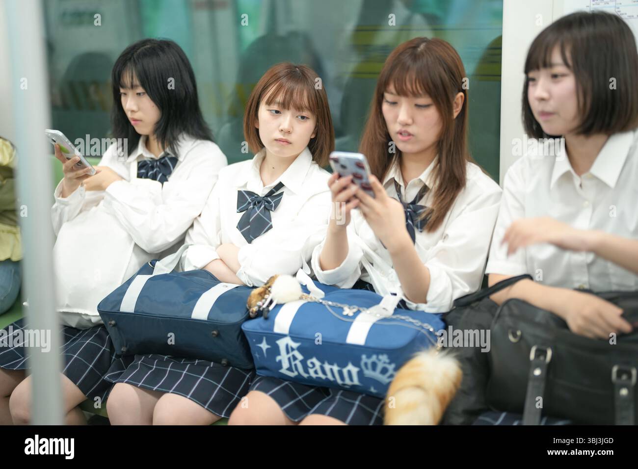 On a spring morning in the Shanghai subway, a group of Japanese high ...