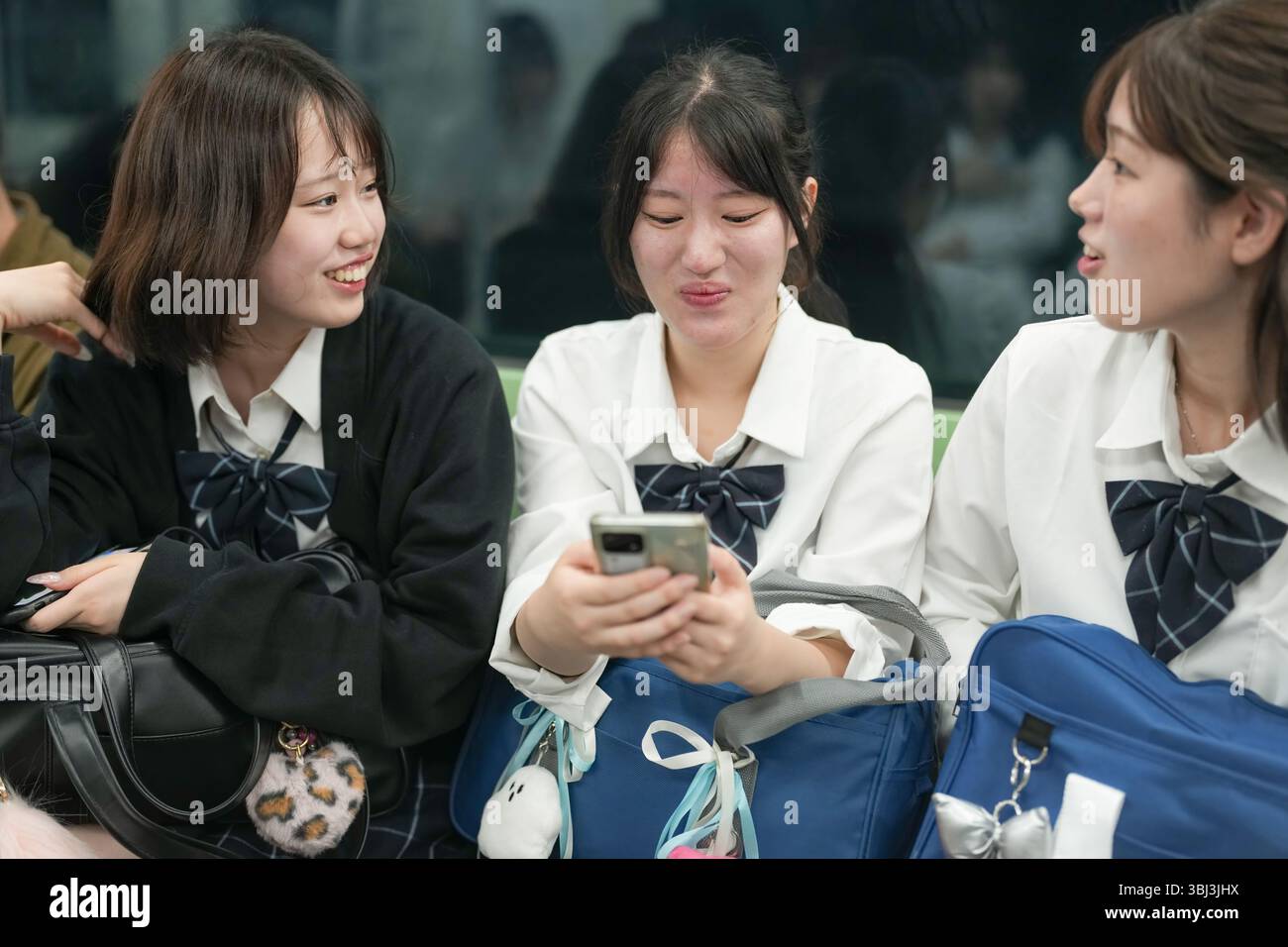 On a spring morning in the Shanghai subway, a group of Japanese high ...