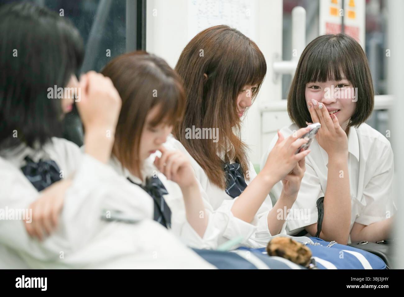 On a spring morning in the Shanghai subway, a group of Japanese high ...