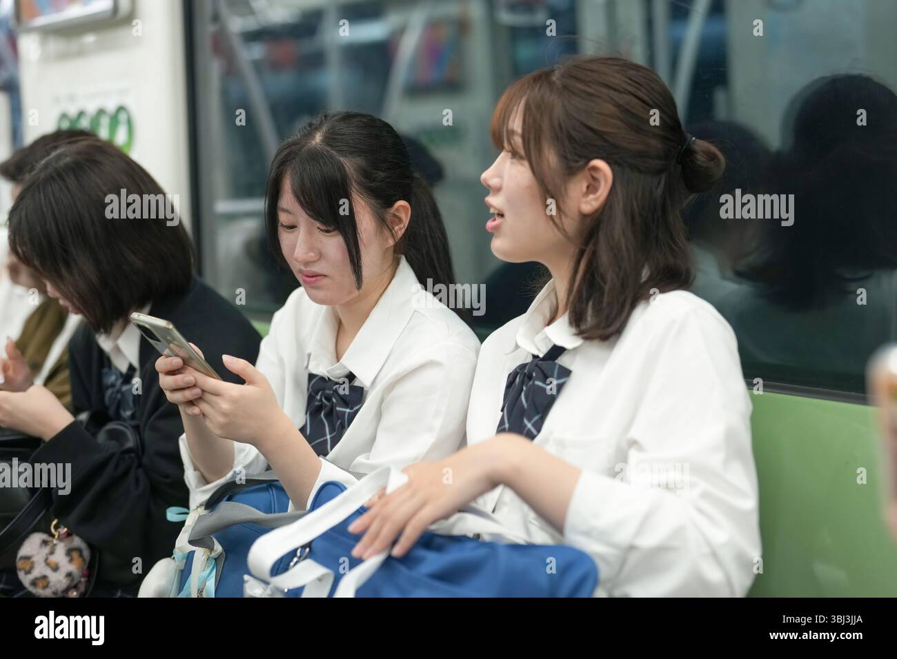 On a spring morning in the Shanghai subway, a group of Japanese high ...
