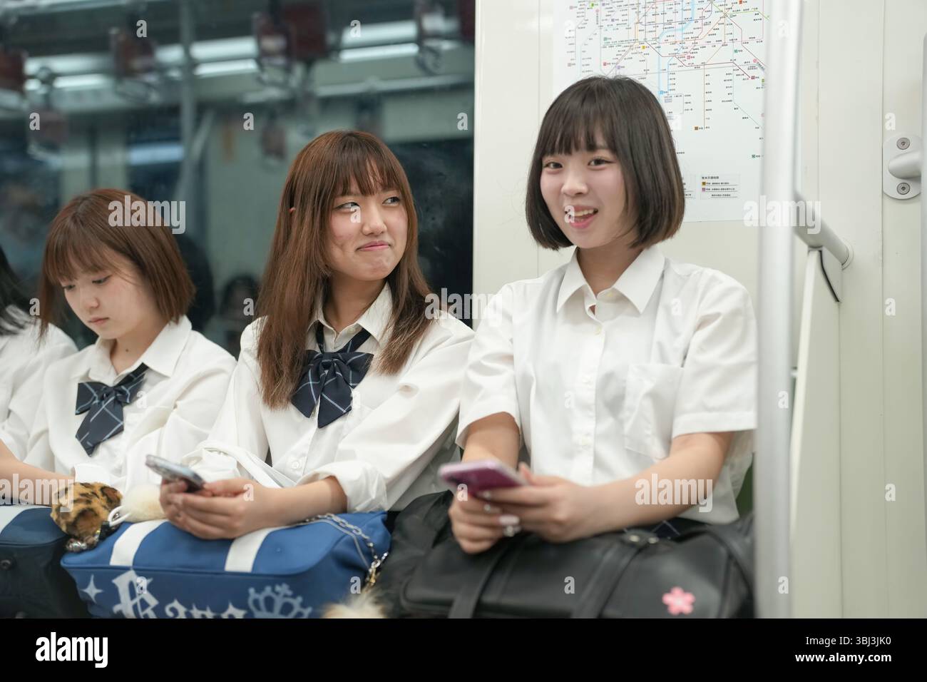 On a spring morning in the Shanghai subway, a group of Japanese high ...