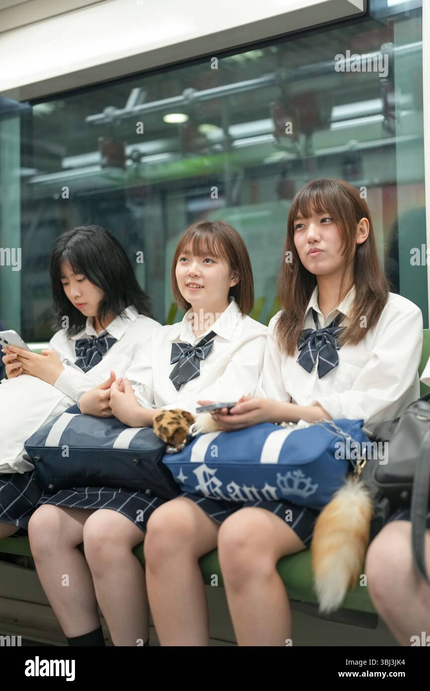 On a spring morning in the Shanghai subway, a group of Japanese high ...